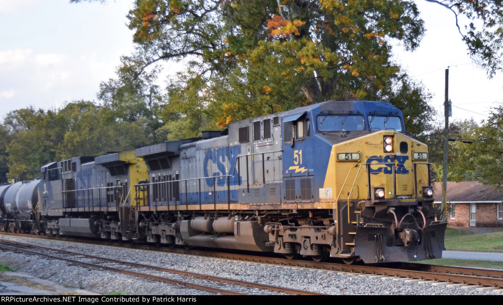 CSX 51 CW44AC and CSX 18 CW44AC rip across Carter Street southbound by Autumn colors with a 20 ...